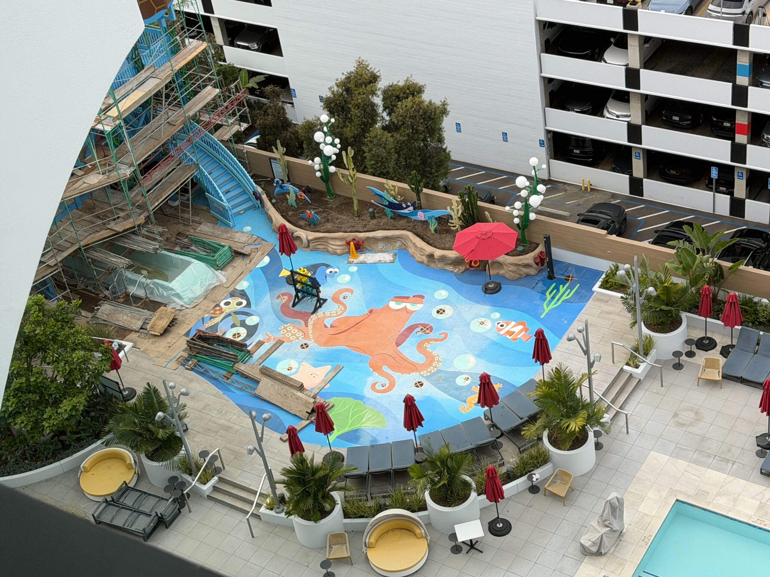Scaffolding Surrounds Crush’s Surfin’ Slide During Pixar Place Pool ...