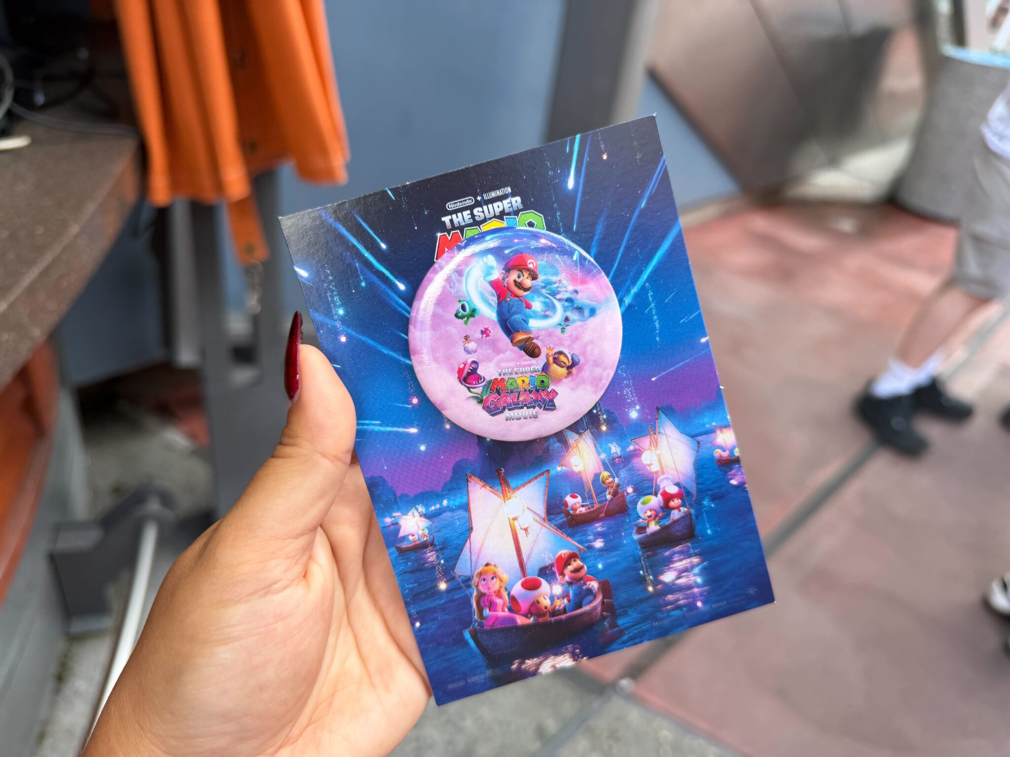 Souvenir ‘The Super Mario Galaxy Movie’ Button Plus Free Movie Tickets ...