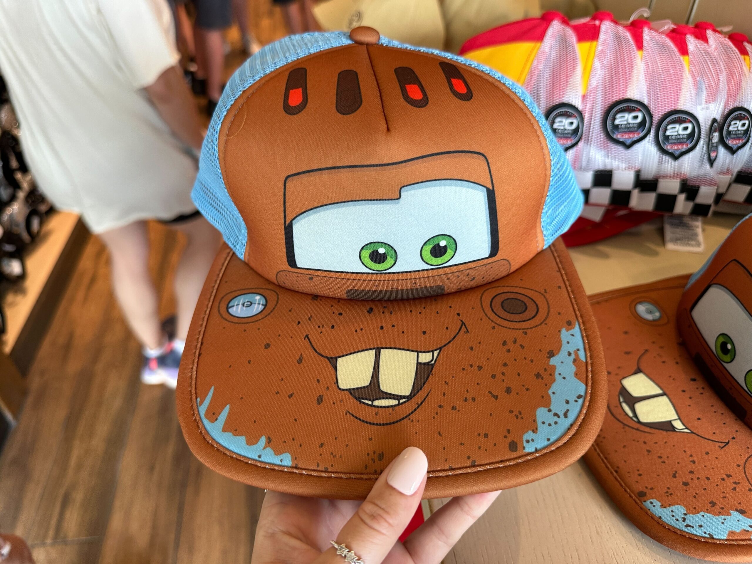 New Tow Mater and Piston Cup Series Hats Race Into World of Disney at ...