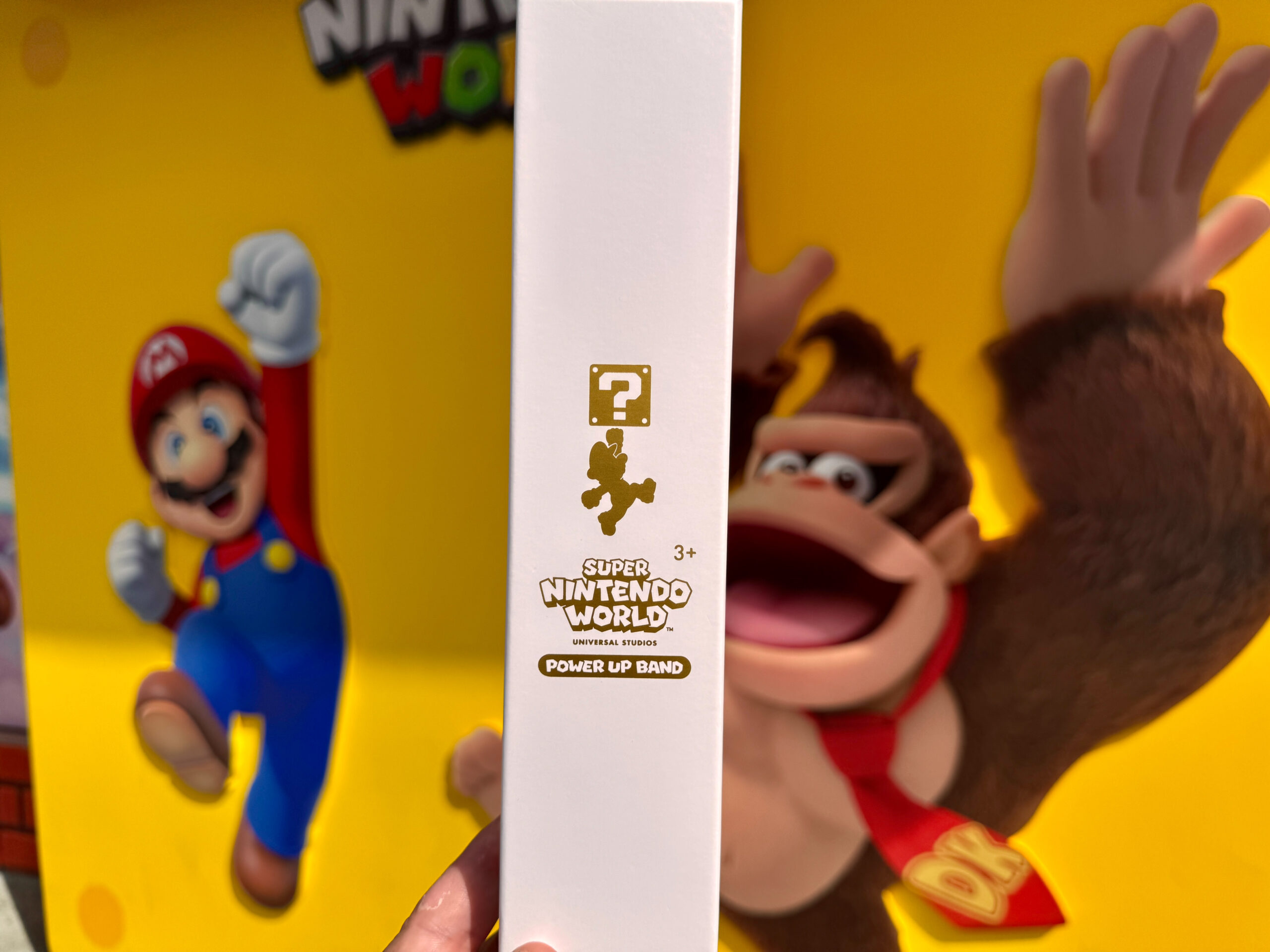 Epic Universe One Year Anniversary: Golden Power Up Band Now Available ...
